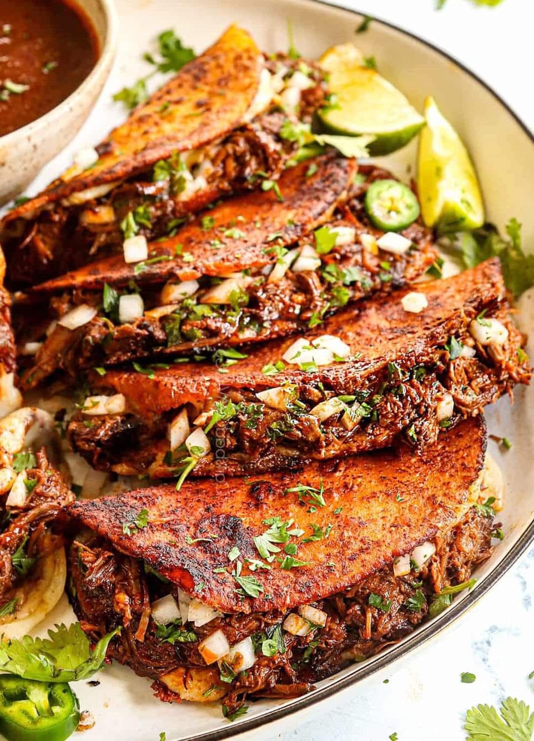 Here is a recipe for making delicious birria tacos at home: - CYSSERO