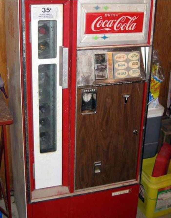 A Sip of Nostalgia: The Vintage Coca-Cola Vending Machine - CYSSERO