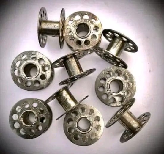 Threads of History: The Evolution and Impact of Sewing Machine Bobbins ...