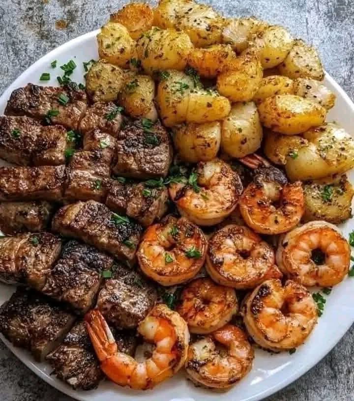 Garlic Butter Steak & Shrimp with Roasted Potatoes - CYSSERO