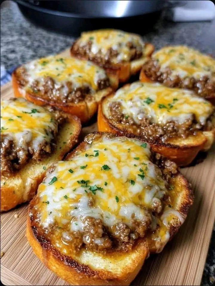 Cheesy Garlic Bread with Savory Ground Beef Topping - CYSSERO